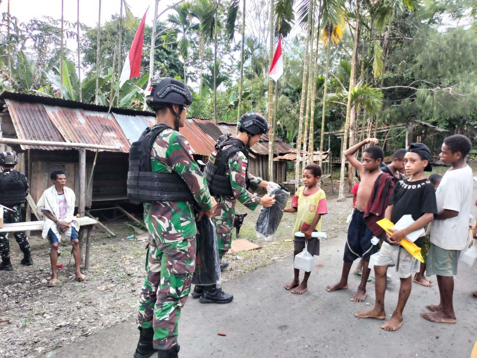 TNI Task Force Distributes Stationery and Bags in Papua – West Papua Now